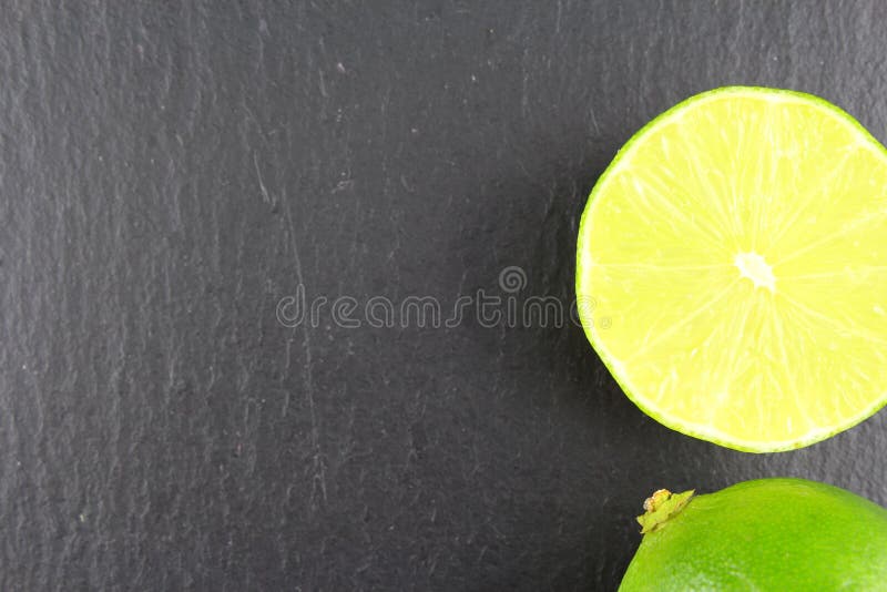 Fresh Lime Fruit on a Slate Plate Food Background Texture Stock Image ...