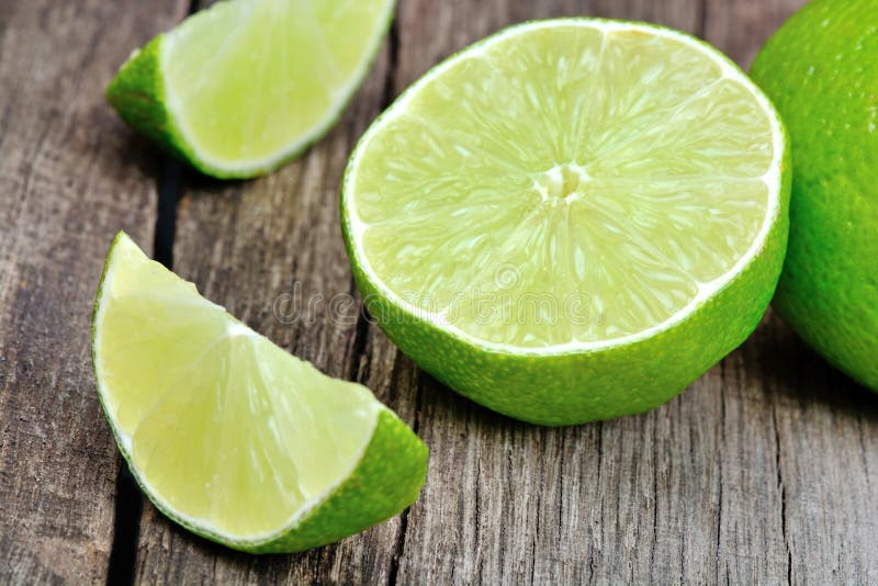 Fresh Lime on Rustic Wood Table Stock Image - Image of healthy, tasty ...