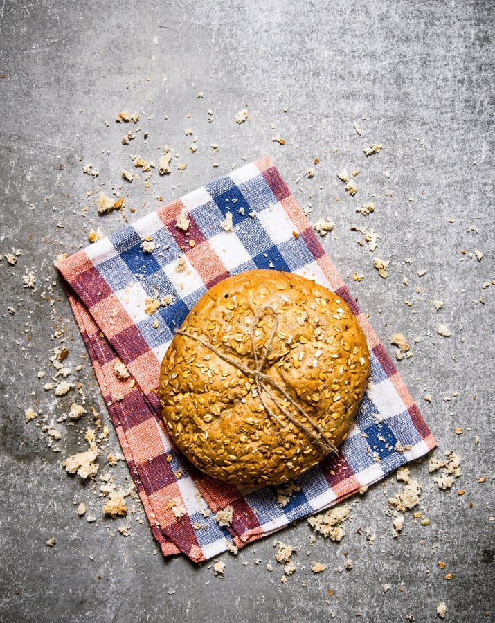Fresh Loaf with Bread Crumbs . Top View Stock Photo - Image of flour ...