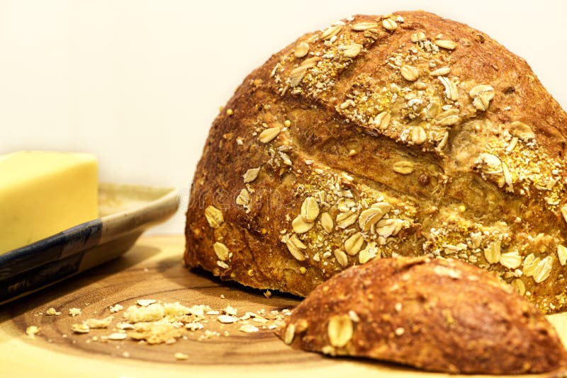 Fresh Loaf of Whole Grain Bread Stock Photo - Image of background ...