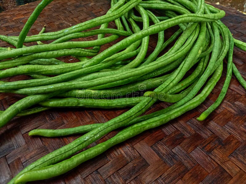 Fresh Long Beans on a Brown Background Stock Photo - Image of herb ...