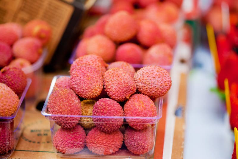 Lychees for sale at market stock photo. Image of ball - 23779756