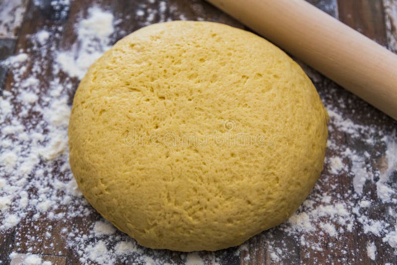 Fresh Made Dough Next To a Classic Wood Rolling Pin Stock Image - Image ... Fresh Made Dough Next To a Classic Wood Rolling Pin Stock Image - Image ...