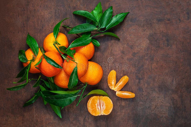 Fresh Mandarin Oranges Fruit or Tangerines with Leaves on Rustic Wooden ...