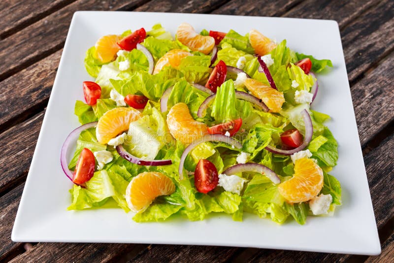 Fresh Mandarin, Vegetables Salad on Wooden Table. Stock Photo - Image ...
