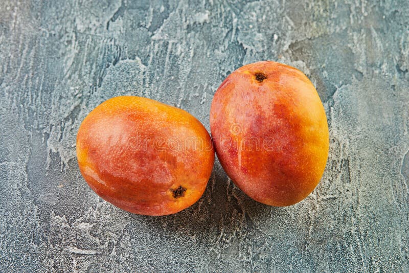 Fresh Mango on Blue Background. Beautiful Homemade Mango Background ...