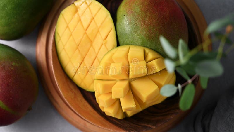 Fresh Mango Slow Motion. Delicious, Juicy Sliced Mango Fruit. Stock ...