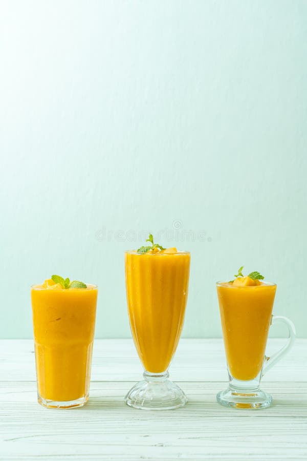 Fresh mango smoothies stock photo. Image of ripe, background - 140454404