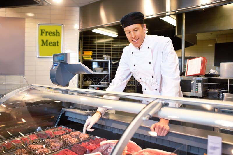 Fresh Meat Counter with Butcher Stock Image - Image of chef, counter ...