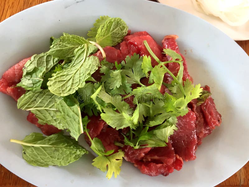 Fresh Meat with Mint Leaf Topping Stock Image - Image of lunch, green ...