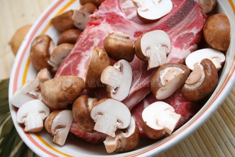 Fresh meat and mushrooms stock image. Image of pork, food - 9207695