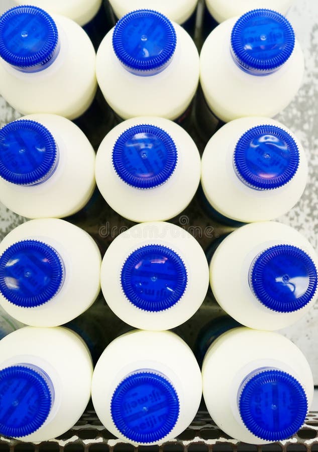 Fresh milk in bottles stock image. Image of group, design - 135390869