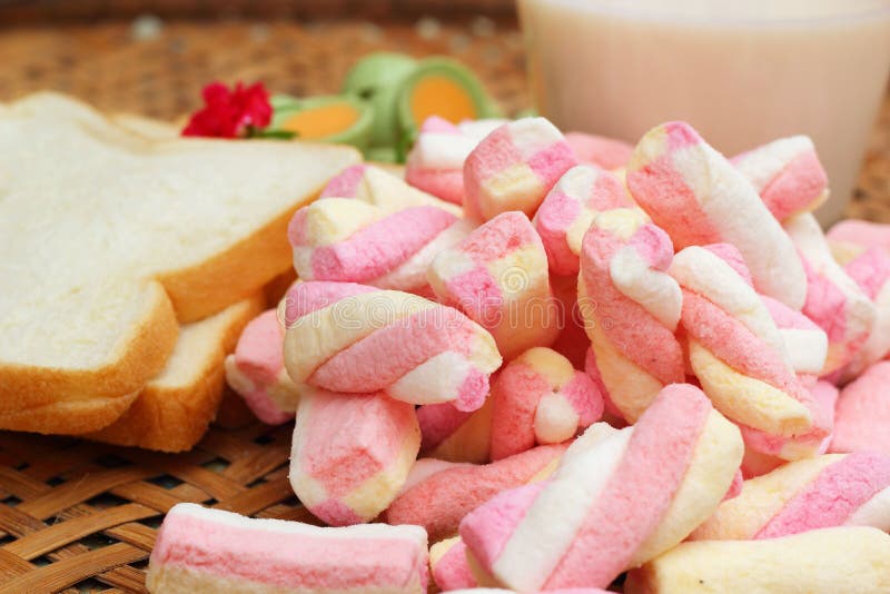 Fresh Milk and Pink Marshmallows with a Slice of Bread. Stock Photo ...