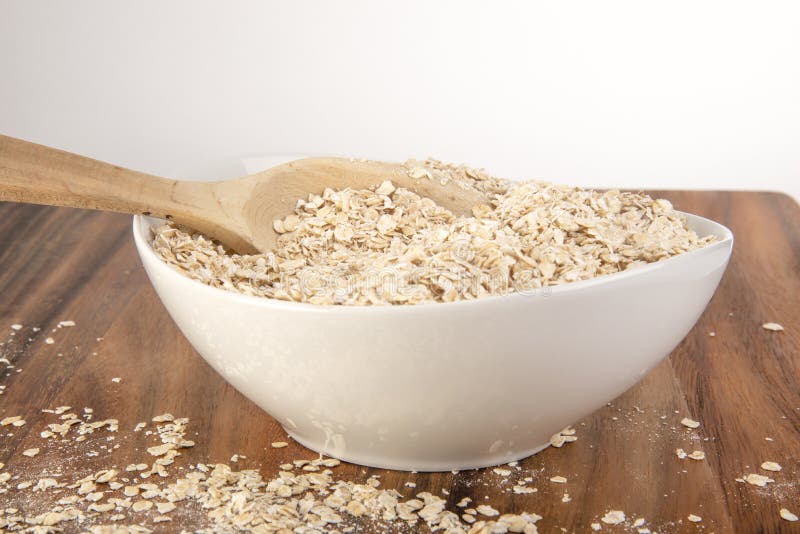 Fresh Milled Raw Uncooked Oats Stock Photo - Image of flakes, golden ...