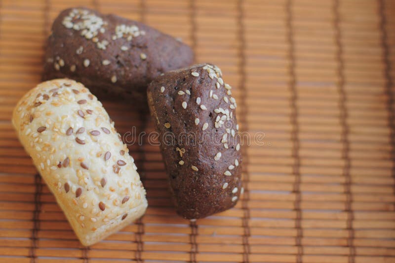 Fresh Mini Bread on Wooden Backround Stock Photo - Image of cereal ...