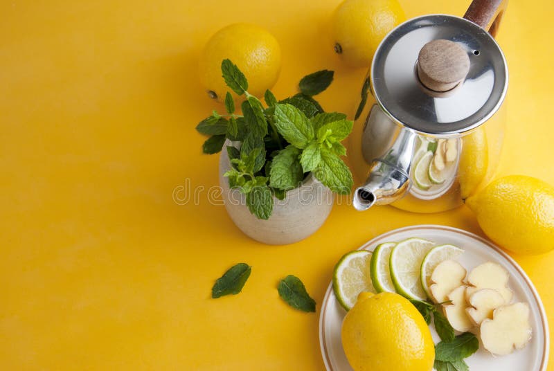 Fresh Mint Tea Ingredients: Mint, Lemon on Yellow Background, Top View ...