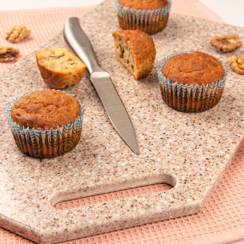 Fresh Muffins on a Kitchen Cutting Board Made of Artificial Stone Stock ...