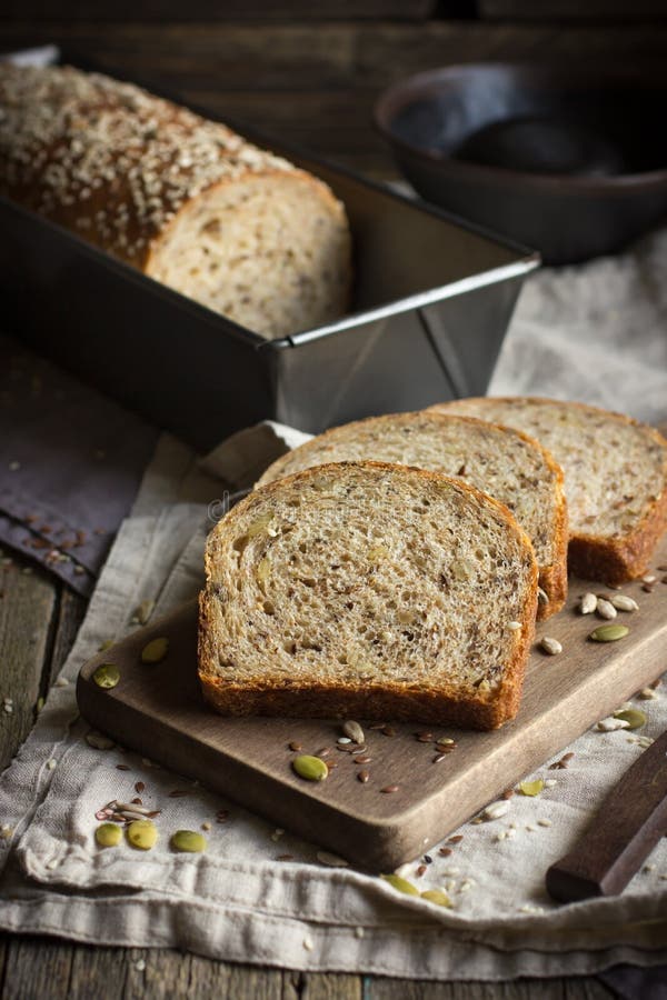 Fresh Multigrain Bread on Rustic Background Stock Image - Image of ...