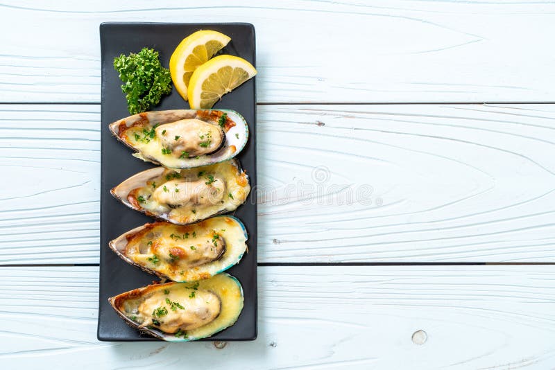 Mussel baked with cheese stock image. Image of shellfish - 160373215