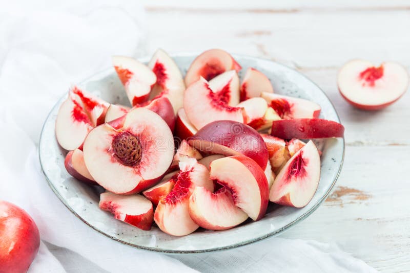 Fresh Nectarines Pieces in Rustic Ceramic Plate Stock Image - Image of ...