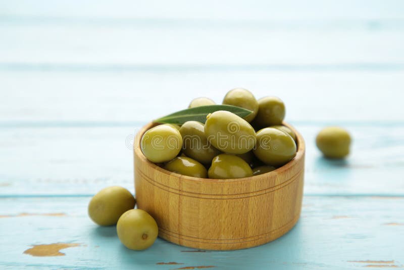 Fresh Olives in Bowl on Blue Background Stock Photo - Image of fresh ...