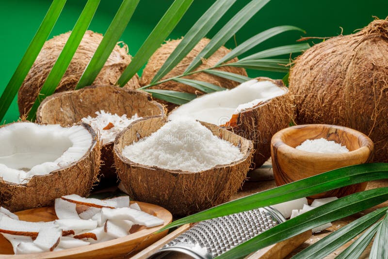 Fresh Opened Coconuts Along with Coconut Slices, Flakes and Coconut ...