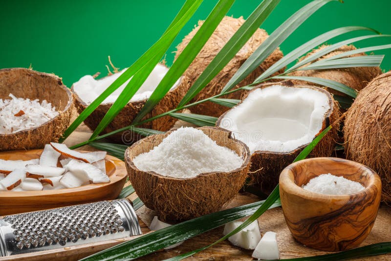 Fresh Opened Coconuts Along with Coconut Slices, Flakes and Coconut ...