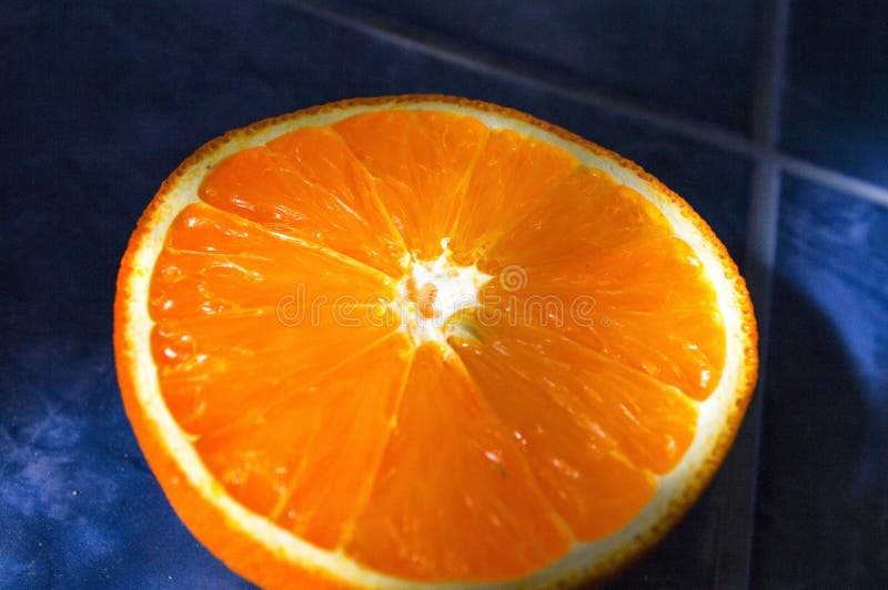 Fresh Orange Halved in Closeup, Oranges Cut in Half Stock Image - Image ...