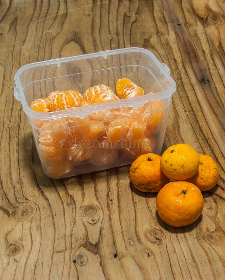 Fresh Orange in Keep Plastic Box on Wood Background Stock Photo - Image ...