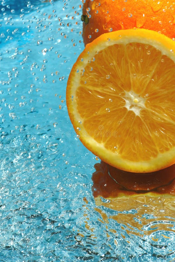 Fresh orange with water stock photo. Image of flowing - 12941442