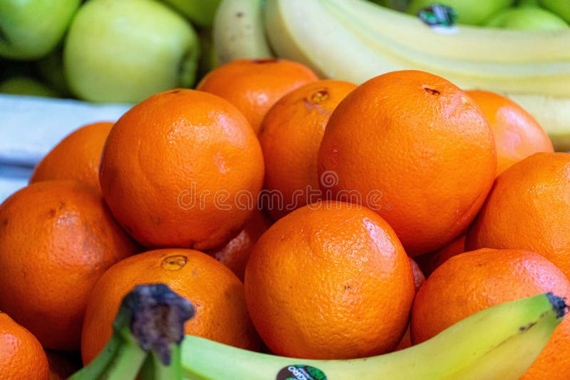 Fresh Oranges at a Fruit Stand Stock Image - Image of bright, yellow ...