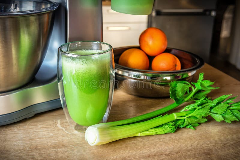 Fresh Organic Celery Juice on the Kitchen Table Stock Photo - Image of ...