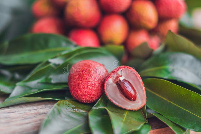 Fresh Organic Lychee Fruit and Lychee Leaves on a Rustic Wooden ...