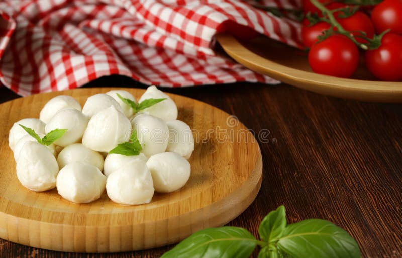 Fresh Organic Mini Mozzarella Cheese Stock Photo - Image of green ...