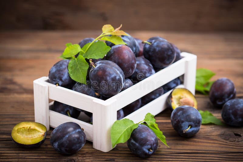 Fresh Organic Plums in the Crate Stock Photo - Image of group, dessert ...