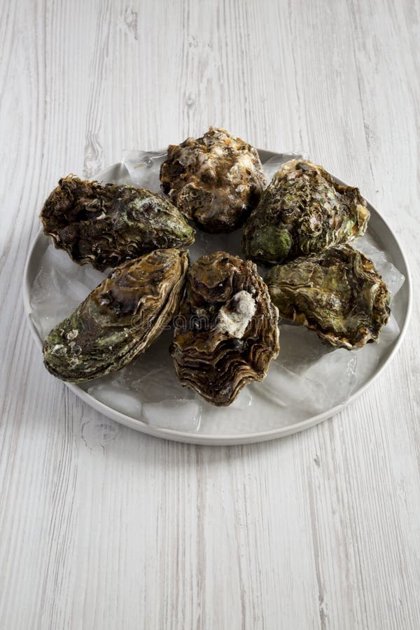 Raw Oysters and Side Dishes in Thai Style with Spicy Dipping Sauce ...