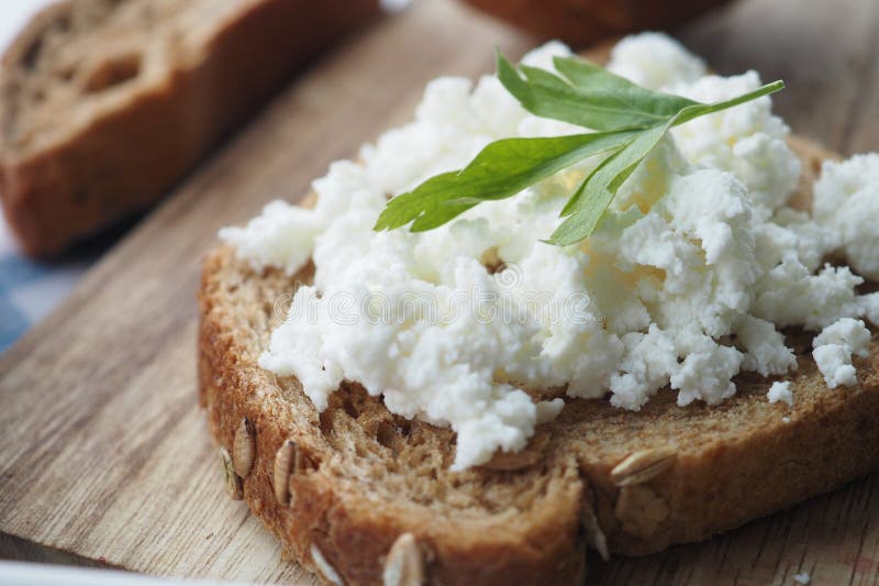 Fresh Paneer on a Bread on Table Stock Photo - Image of cheese, bread ...