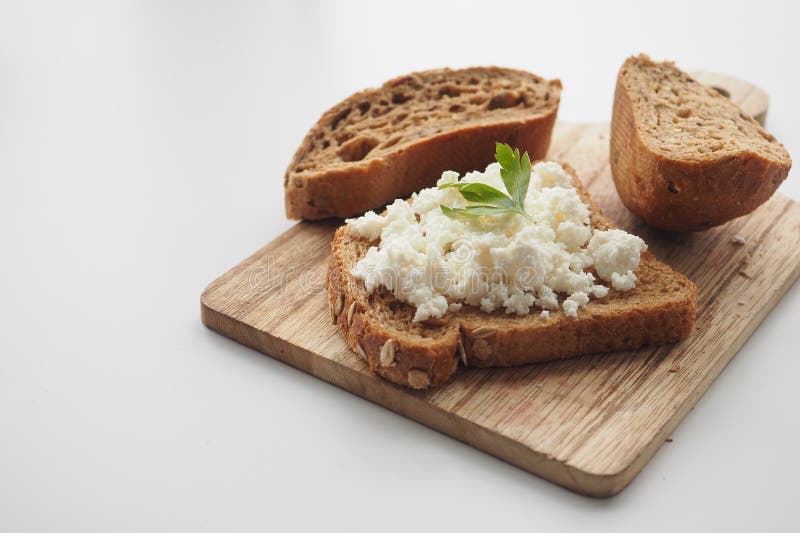Fresh Paneer on a Bread on Table Stock Photo - Image of slate, food ...