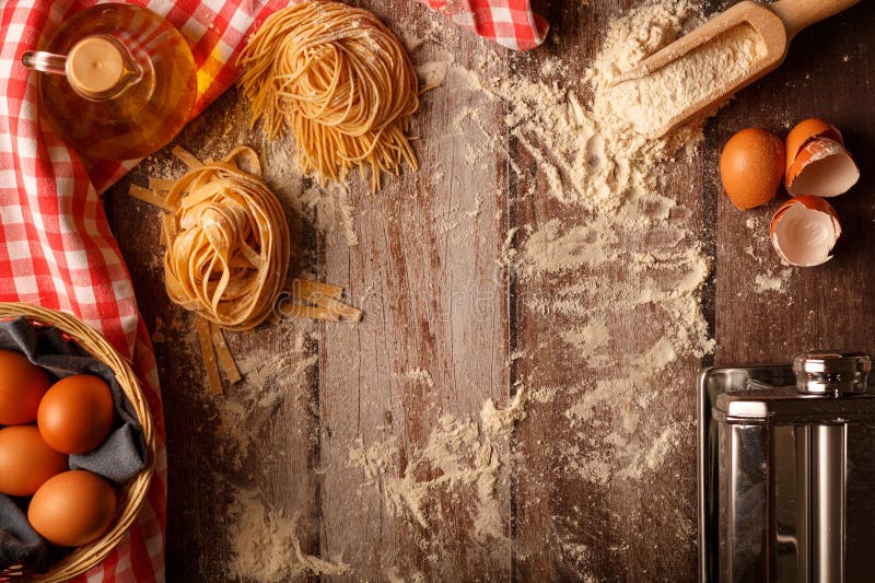 Fresh Pasta Homemade Preparation. Pasta Make Machine and Ingredients on ...