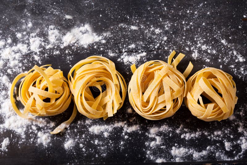 Fresh Pasta on a Wooden Table Stock Photo - Image of still, cooking ...