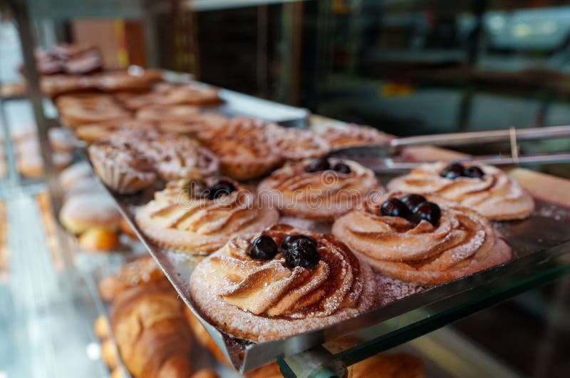 Fresh Pastries Behind the Glass Stock Photo - Image of cafe, snack ...