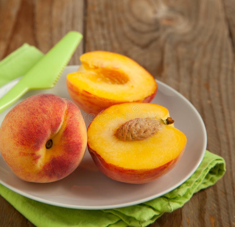 Fresh peaches on plate stock image. Image of peach, meal - 33090473