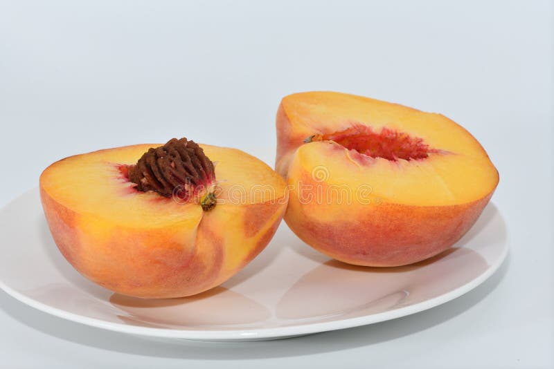 Fresh peaches sliced open stock image. Image of appetizing - 290177611
