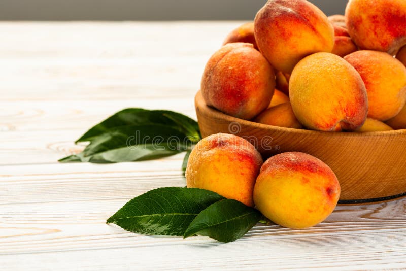 Fresh peaches on the table stock image. Image of harvest - 123068027