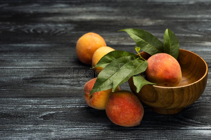 Fresh peaches on the table stock photo. Image of drupe - 123068066