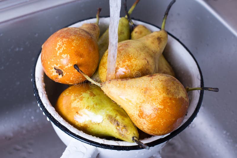 Fresh Pear is Washed in the Kitchen Sink Stock Photo - Image of healthy ...