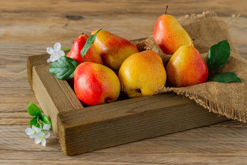 Fresh Pears with Leaves in a Wooden Box on Wooden Background Stock ...
