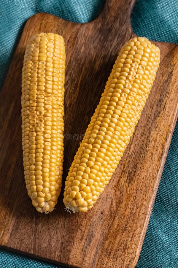 Fresh and Peeled Corn on a Wooden Cutting Board Stock Image - Image of ...