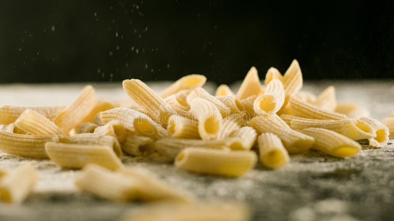Fresh Penne Rigate Pasta with Flour on Kitchen Table Stock Image ...