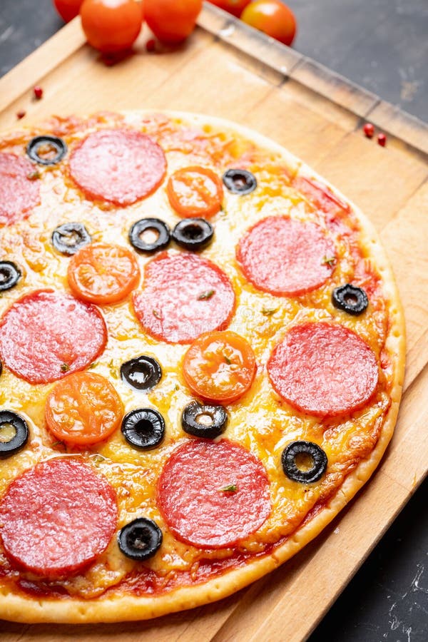 Fresh Pepperoni Pizza Served on the Rustic Background Stock Photo ...